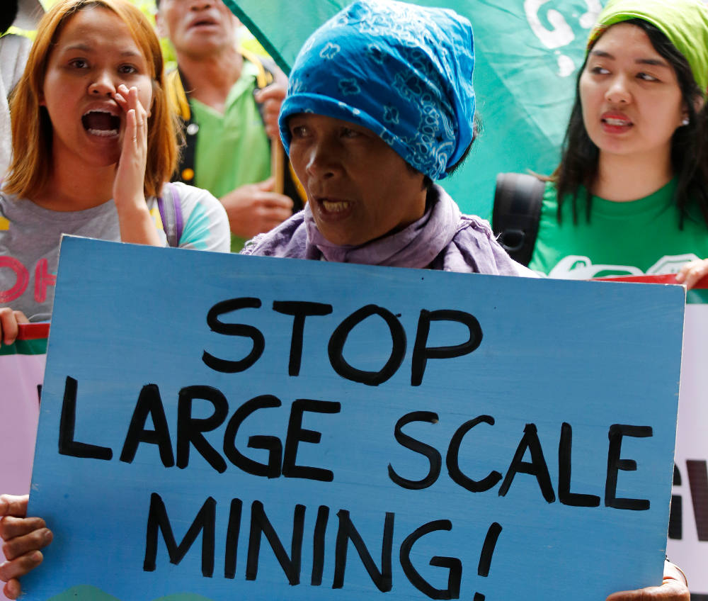 Residents of Philippines mining town protest reopening of coal mine ...